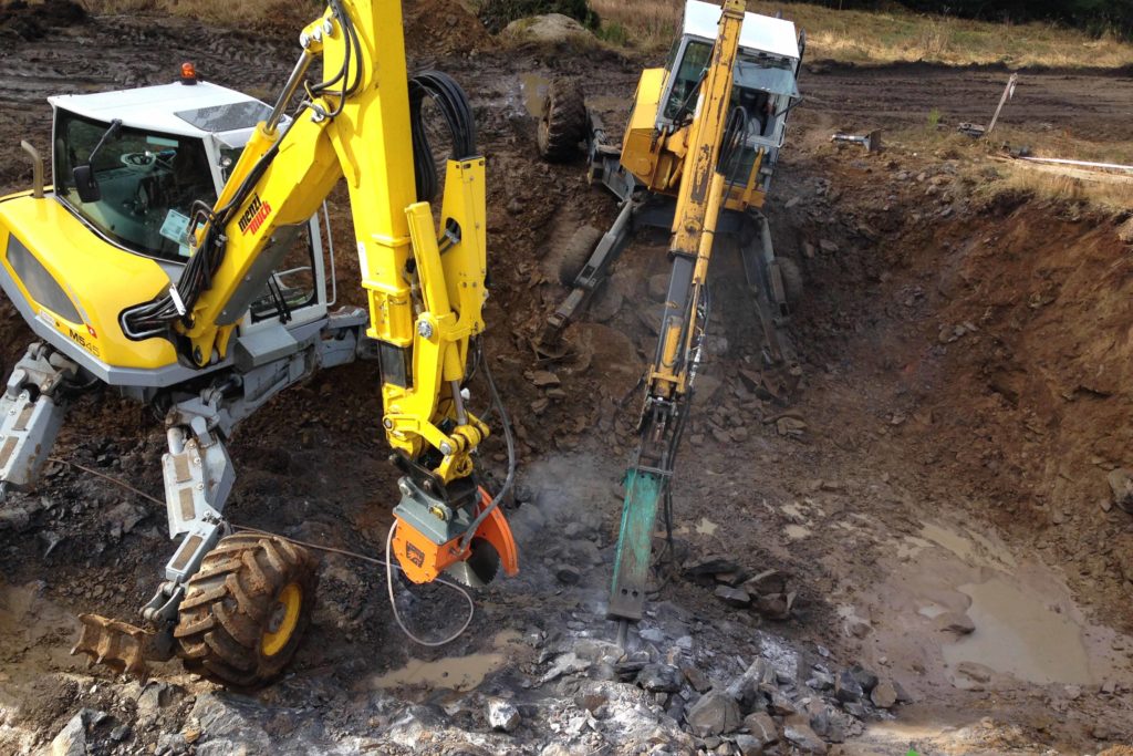 Demolition – Menzi Muck